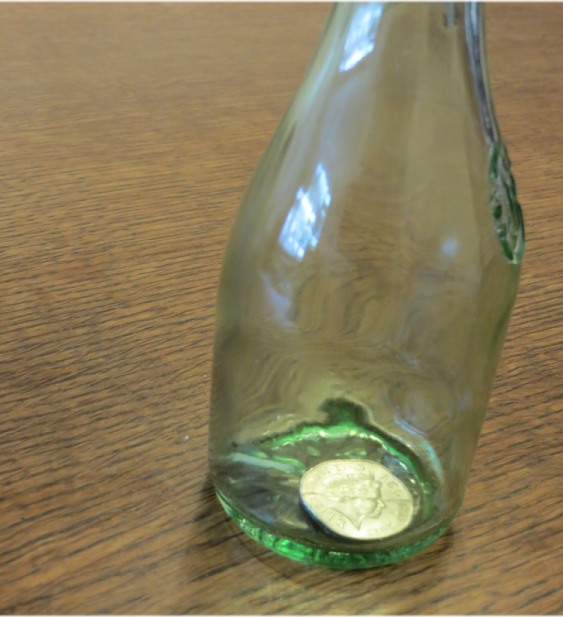 The Coin in the Bottle Trick – PAUL TOMLINSON